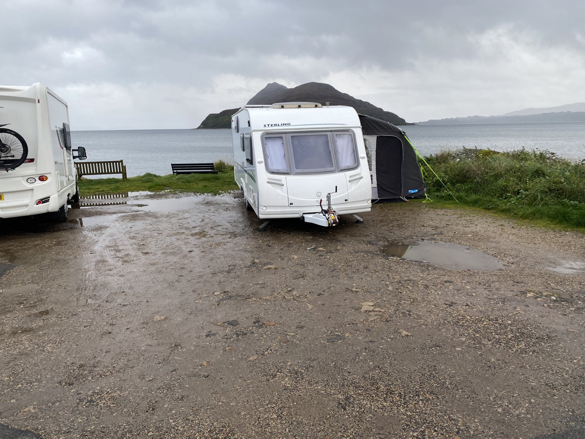 Caravan with awning on small car park on Arran | Wild Camping for ...